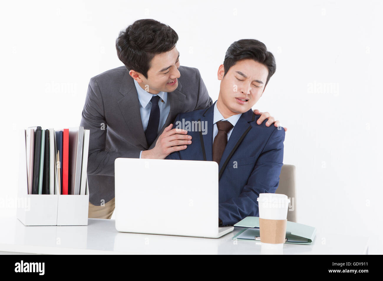 Portrait of business man encouraging his coworker Stock Photo - Alamy