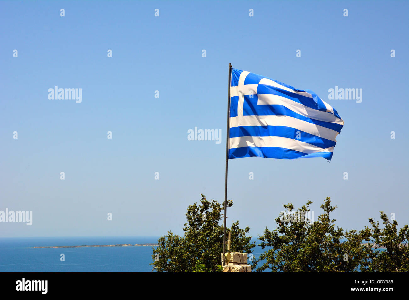 The Greek flag flying above Kephalonia, Greece Stock Photo - Alamy