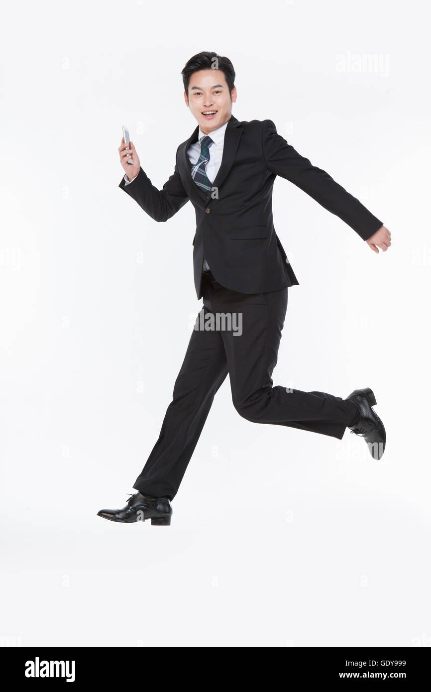 Business man running hi-res stock photography and images - Alamy