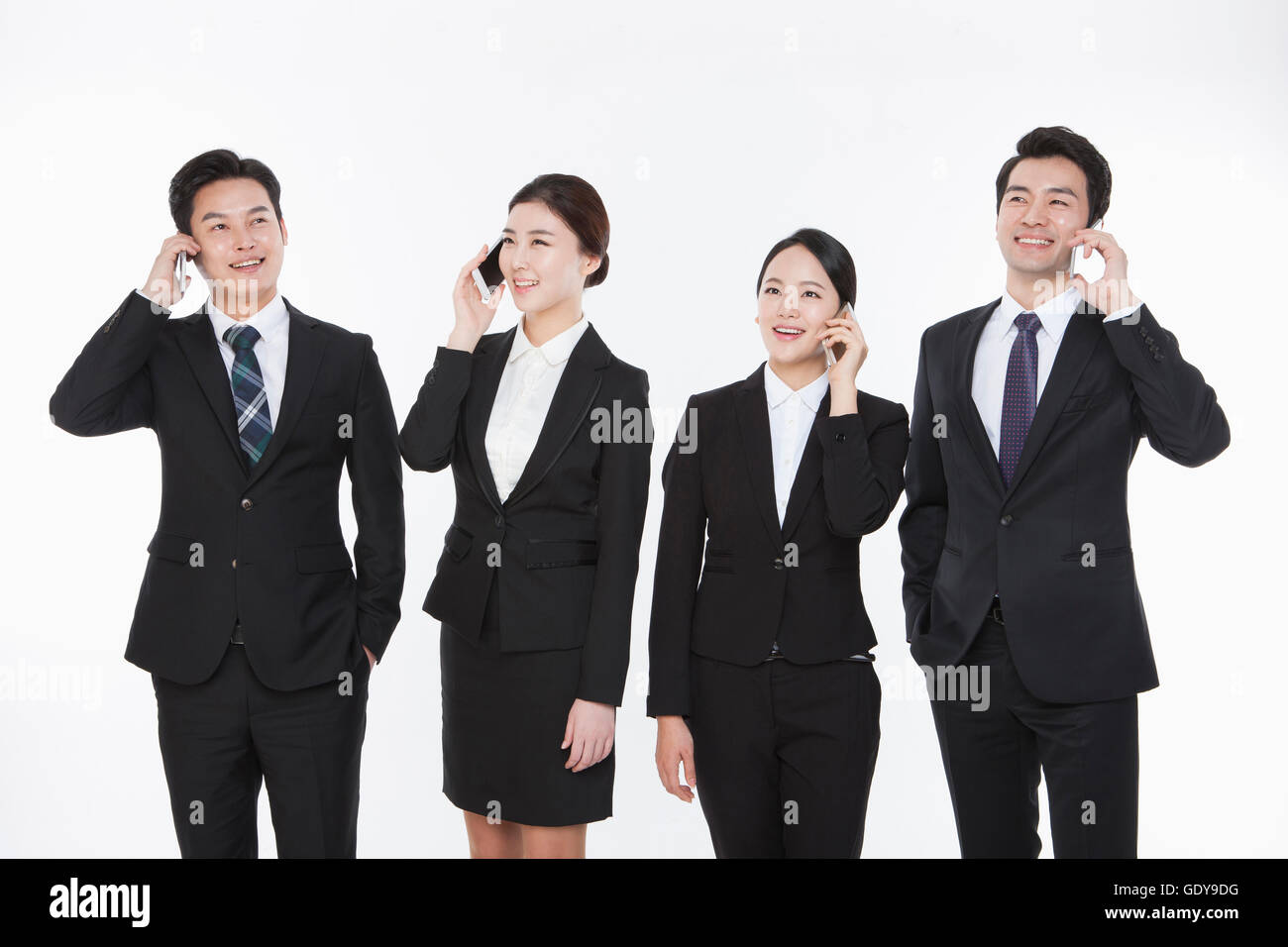 Four people talking hi-res stock photography and images - Alamy