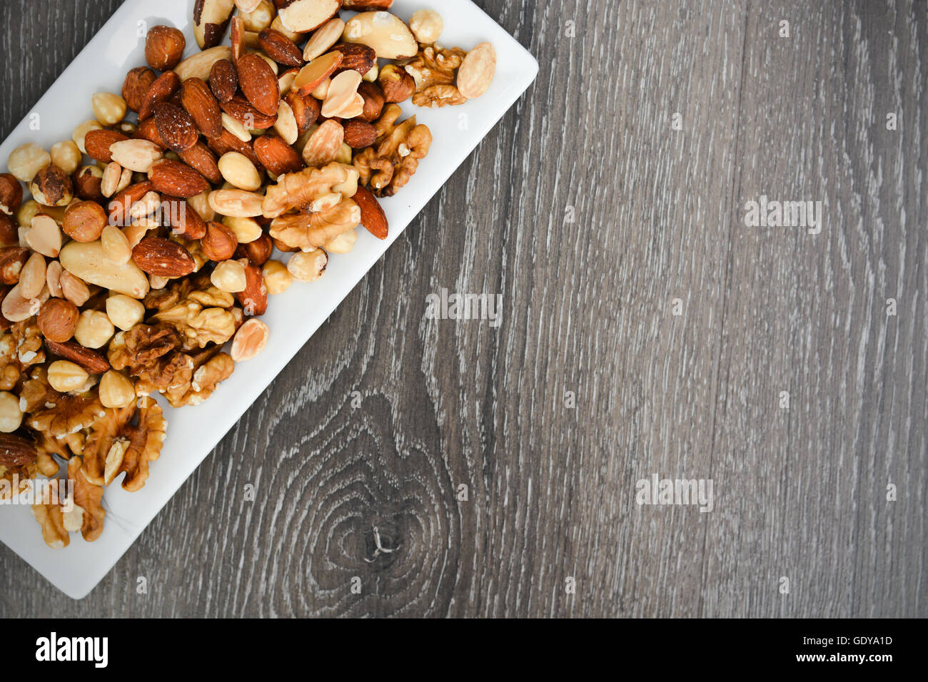 Mixed nuts in a bowl Stock Photo - Alamy