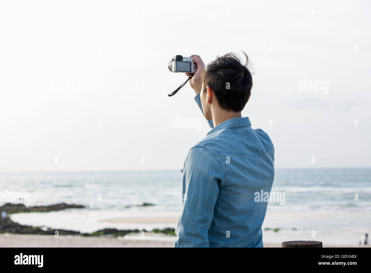 Man with his back to the camera hi-res stock photography and images - Alamy