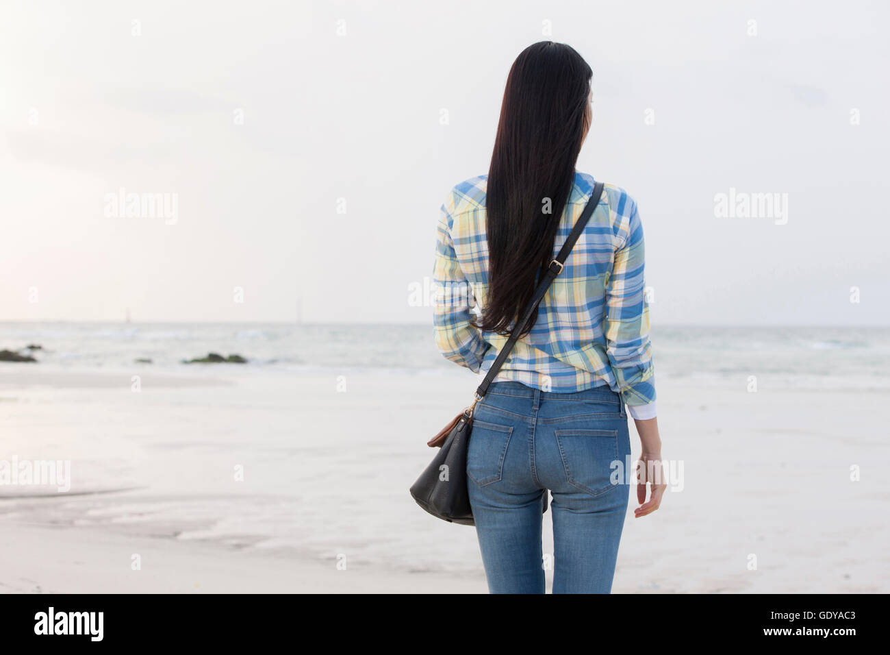 Back of woman beach hi-res stock photography and images - Alamy