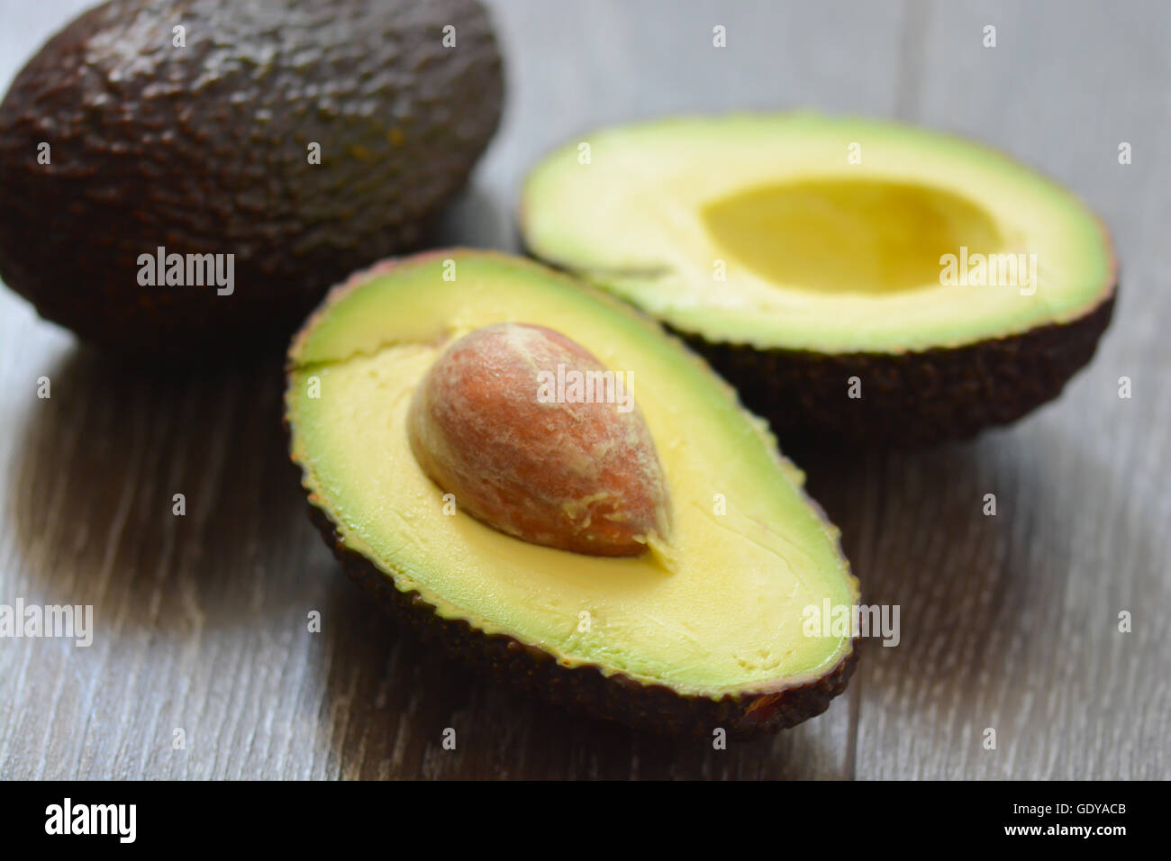 Fresh avocado fruit cross section Stock Photo - Alamy