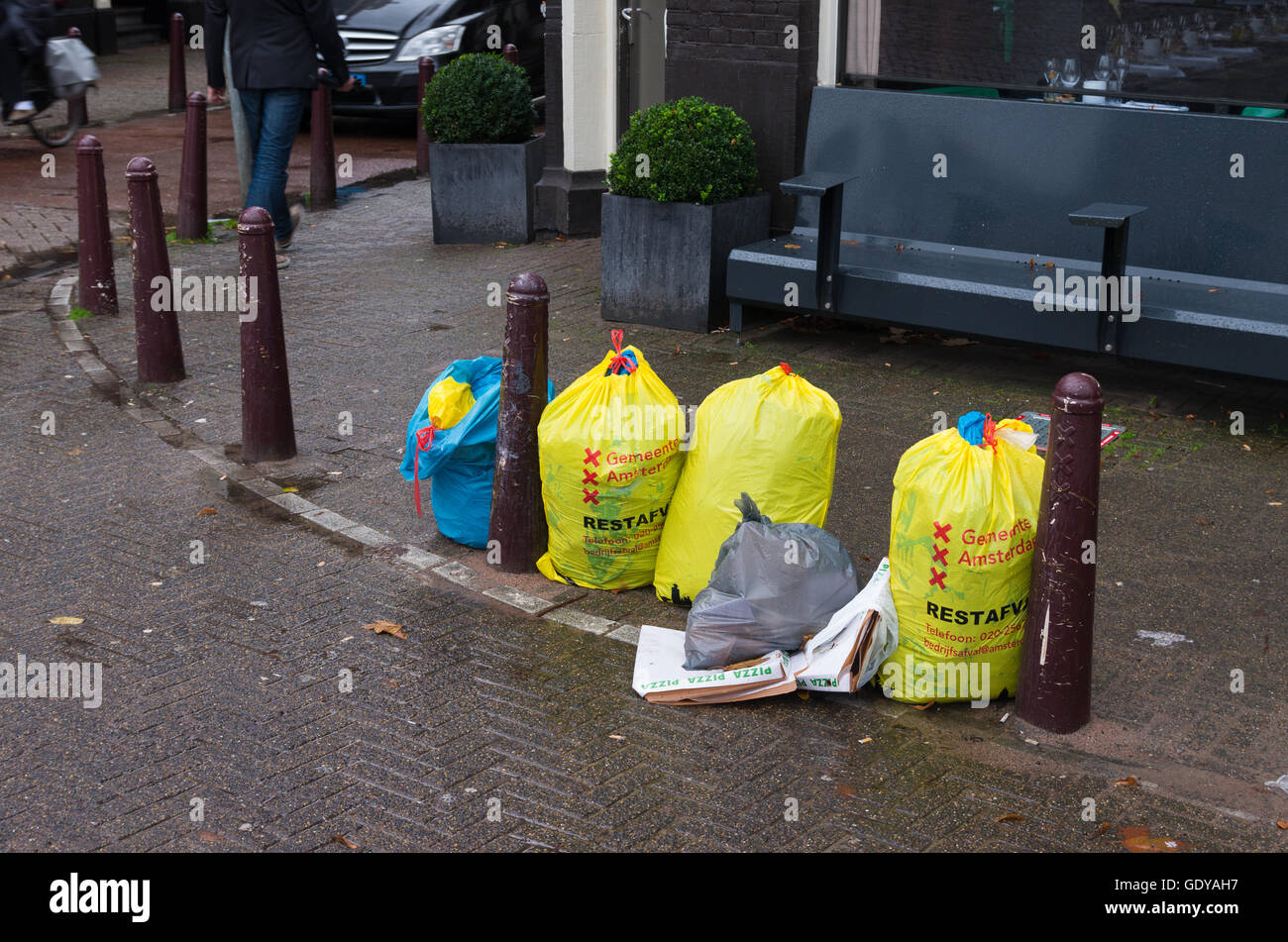 AMSTERDAM, NETHERLANDS - NOVEMBER 15, 2015: Garbage in the streets of ...