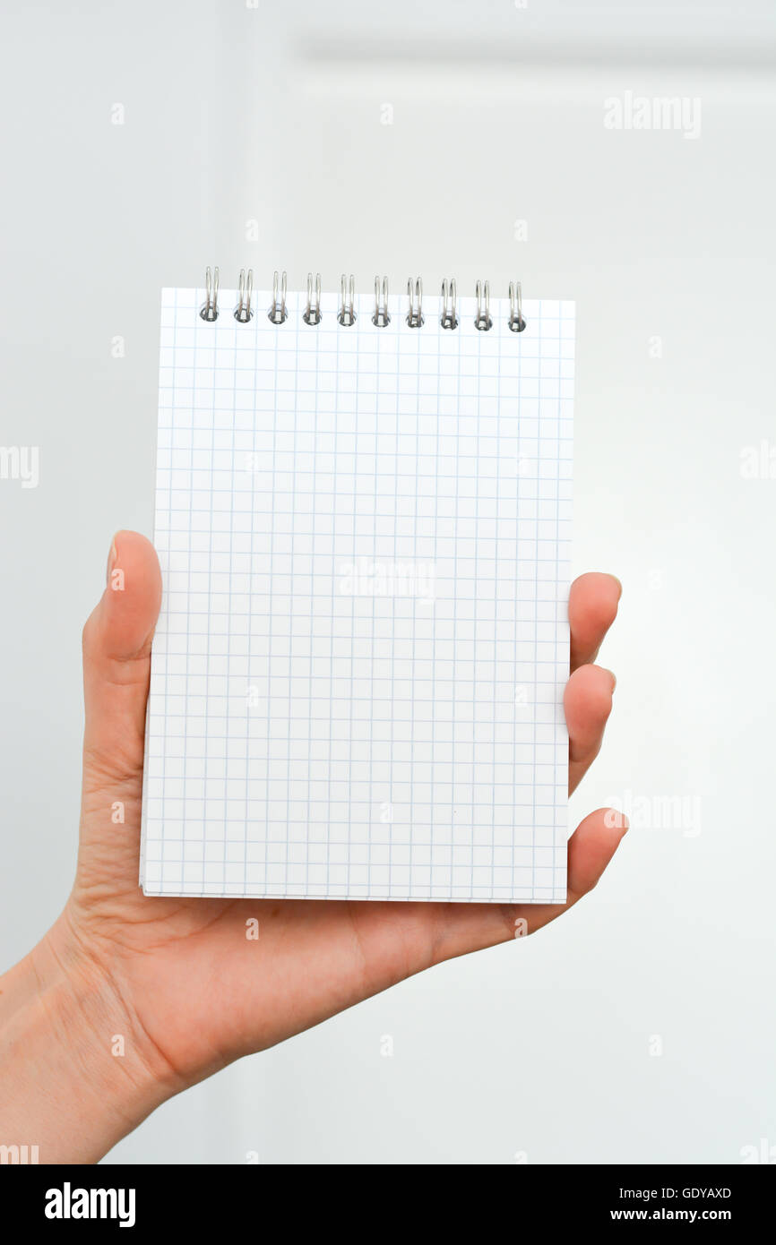 Woman showing blank page hi-res stock photography and images - Alamy