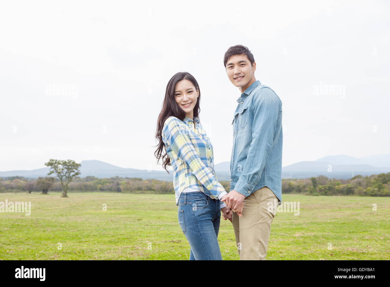 Side view standing hands hi-res stock photography and images - Alamy