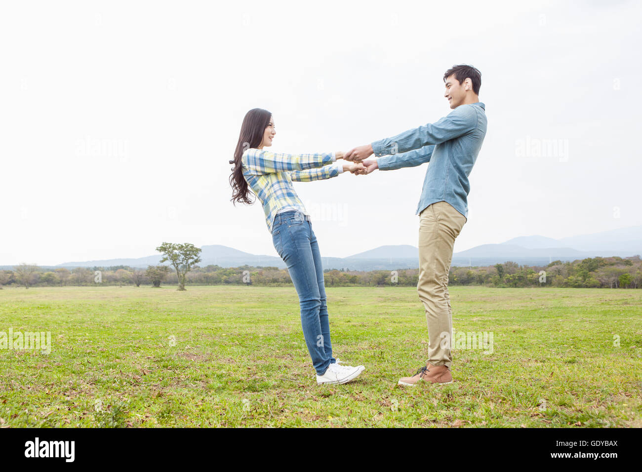 Side view standing hands hi-res stock photography and images - Alamy