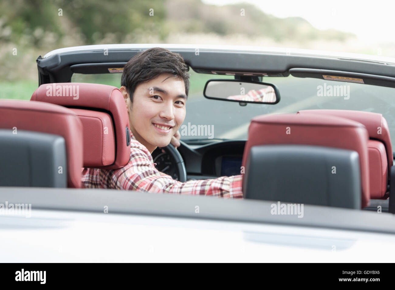 Man in back of car hi-res stock photography and images - Alamy