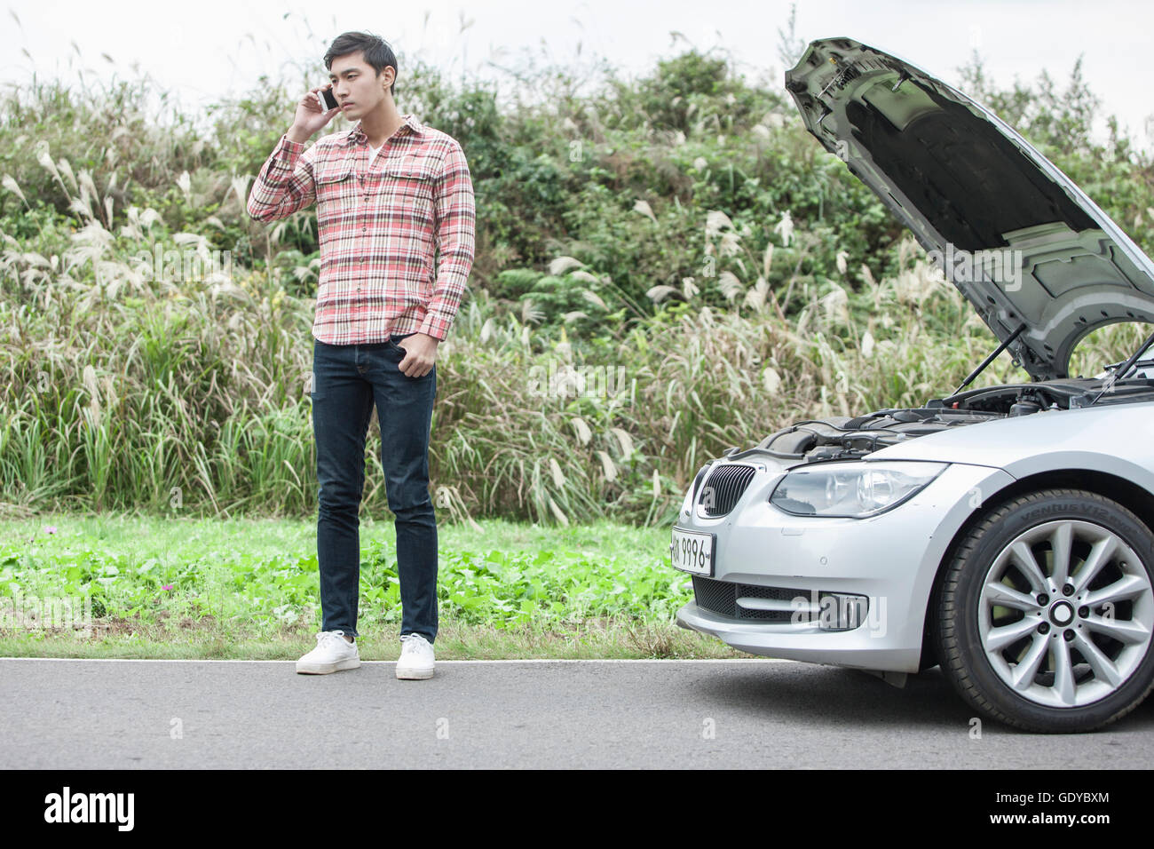 Man standing talking hi-res stock photography and images - Alamy