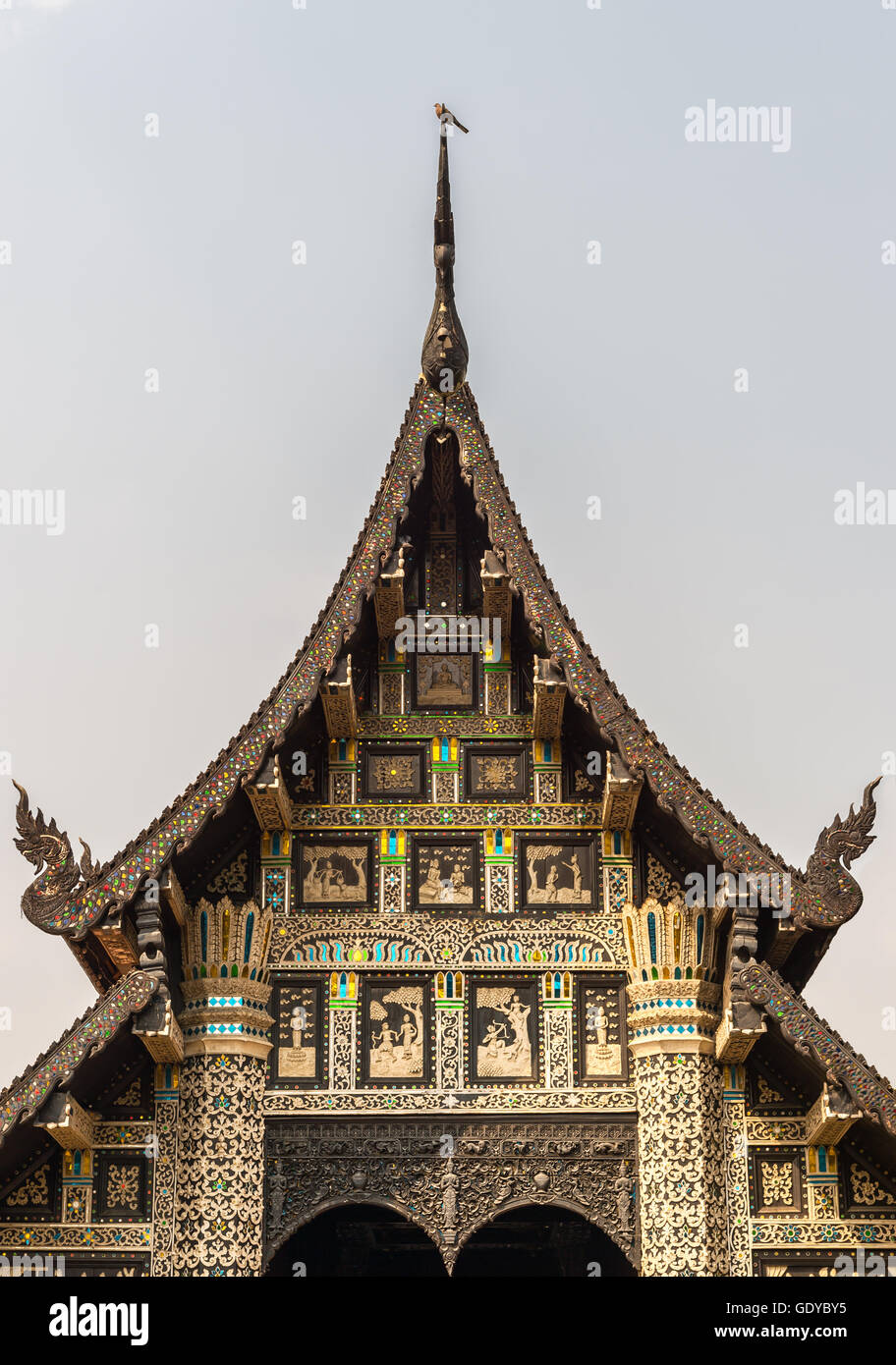 Bird at the top of temple roof in Chiang Mai Thailand Stock Photo - Alamy