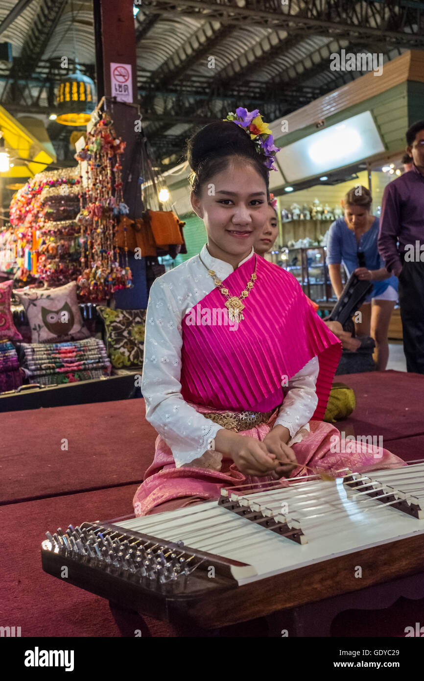 Thai girl playing traditional Khim instrument,Chiang Mai,Thailand Stock Photo - Alamy