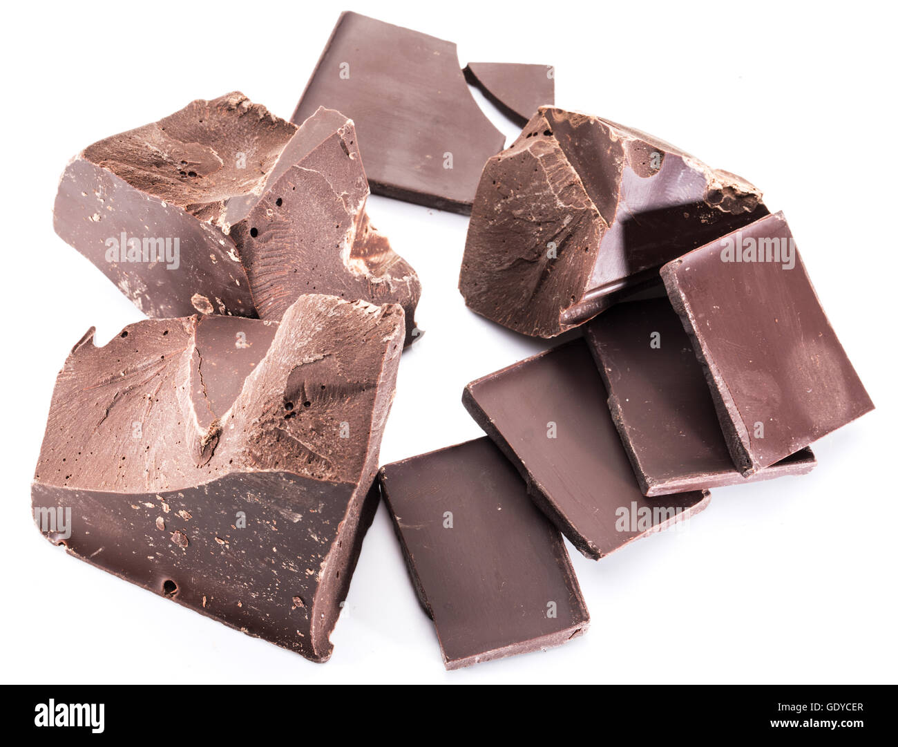 Chocolate blocks and pieces of chocolate bar isolated on a white ...