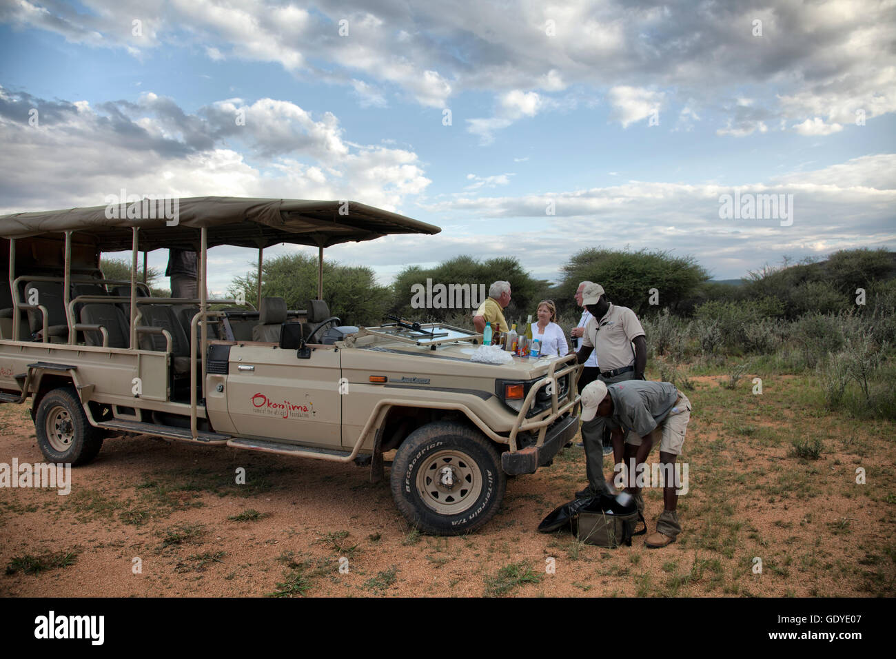 Game Drive Stop for Sundowners at Okonjima Reserve in Namibia Stock ...