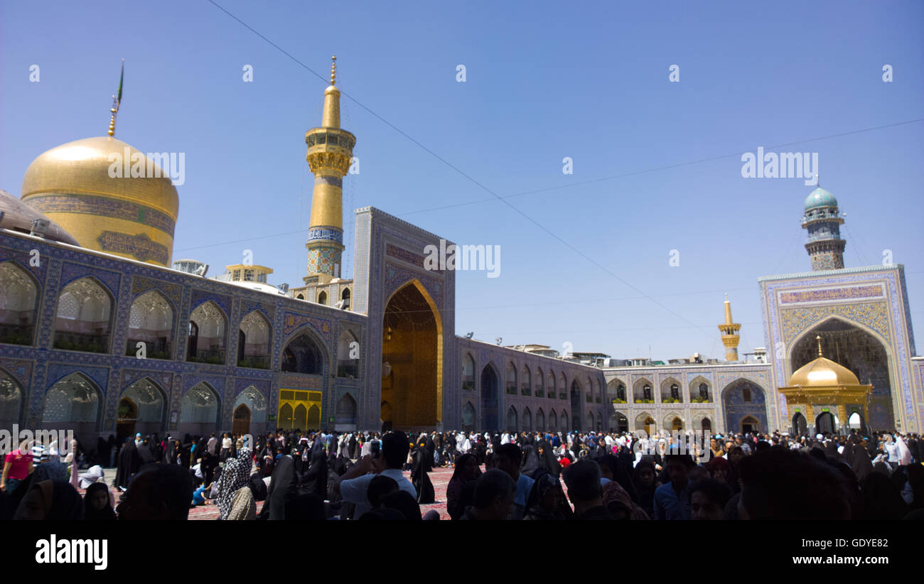 Prayer at the shrine of Imam Ali bin Mussa Alrida Stock Photo - Alamy