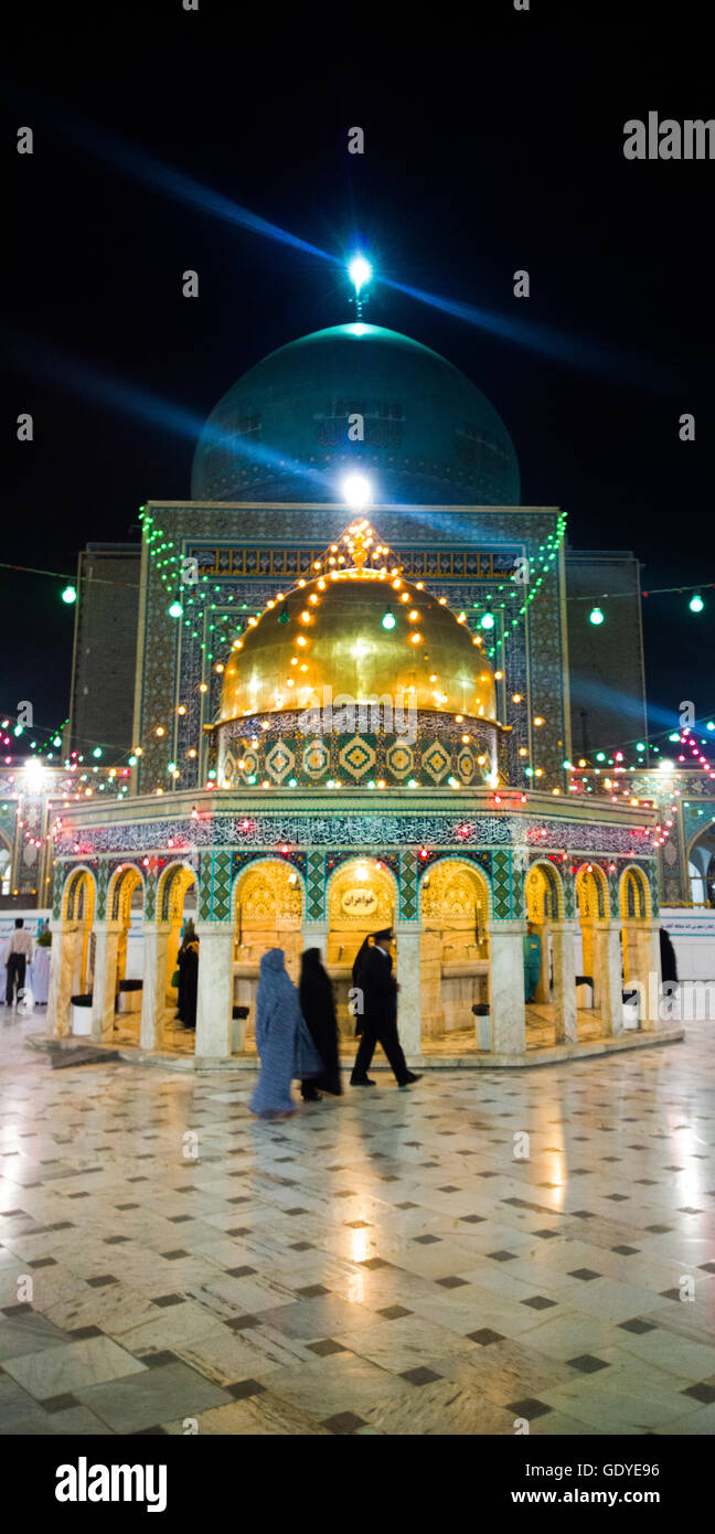 Prayer at the shrine of Imam Ali bin Mussa Alrida Stock Photo - Alamy