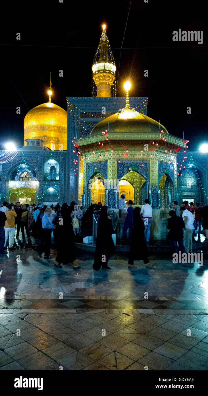 Prayer at the shrine of Imam Ali bin Mussa Alrida Stock Photo - Alamy