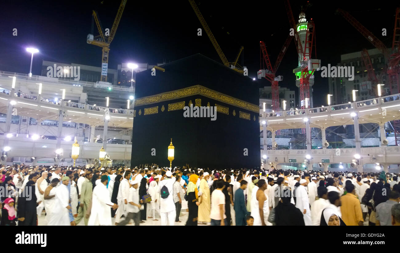 Picture Of The Kaaba And A Group Of Pilgrims They Walk Around To ...