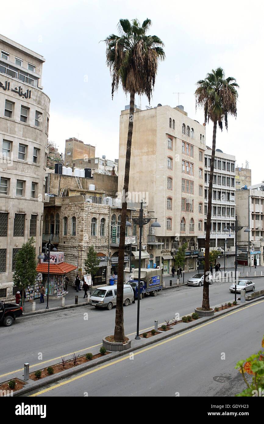 View of a street with shops in downtown Amman. Amman is the capital of ...