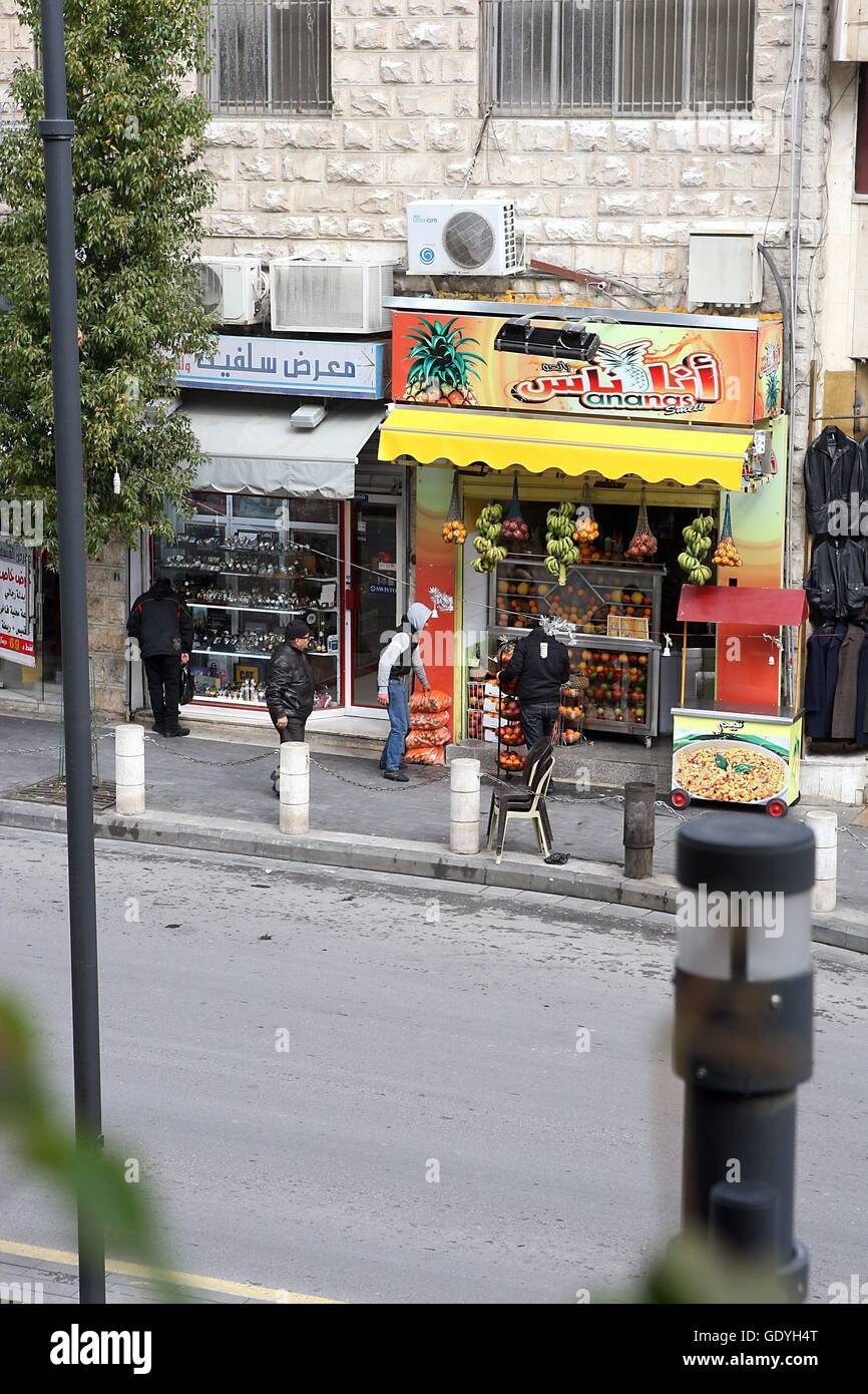 A view on a street with shops in Amman the capital of Jordan ...