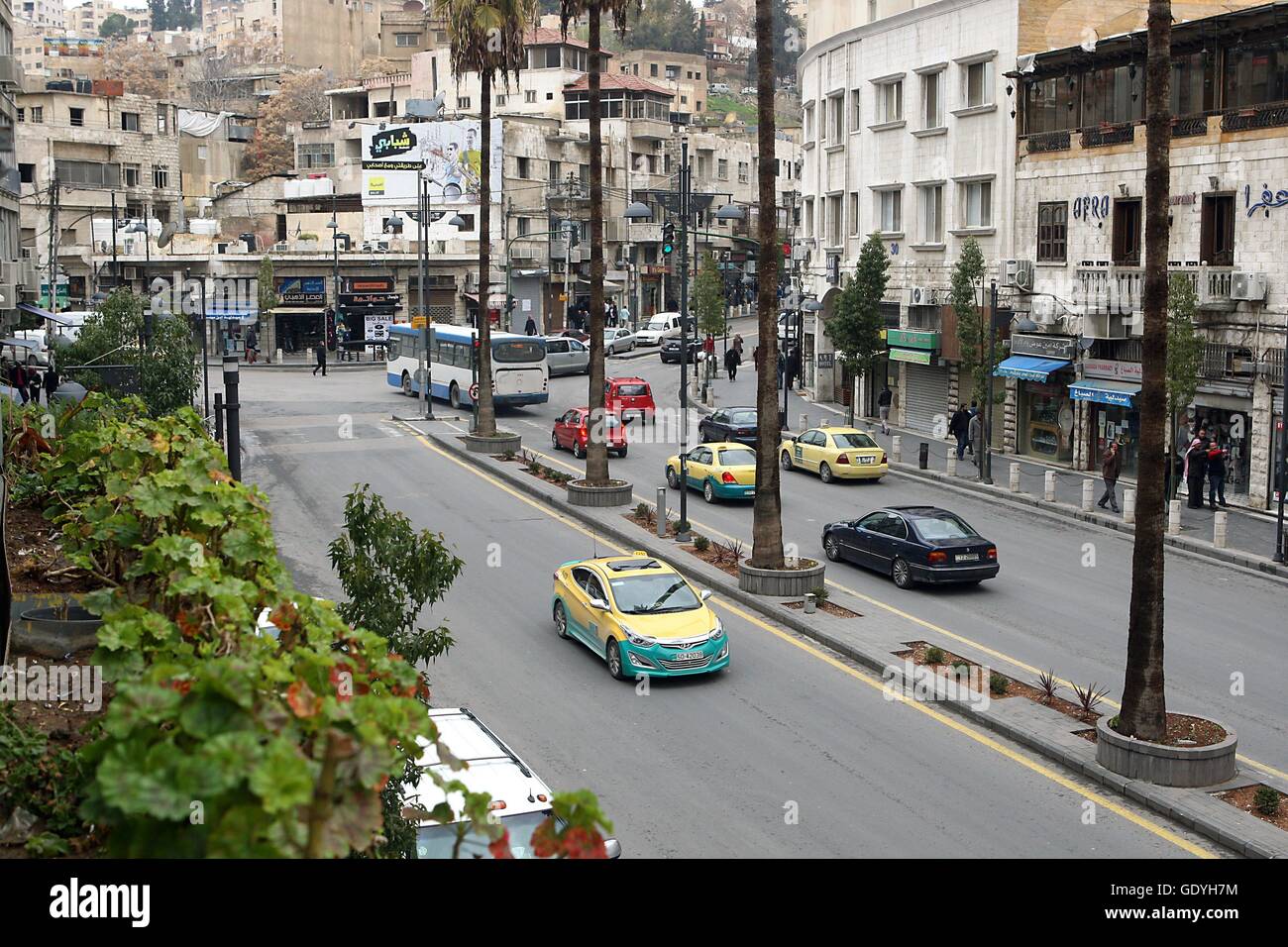 View of a street with shops in downtown Amman. Amman is the capital of ...