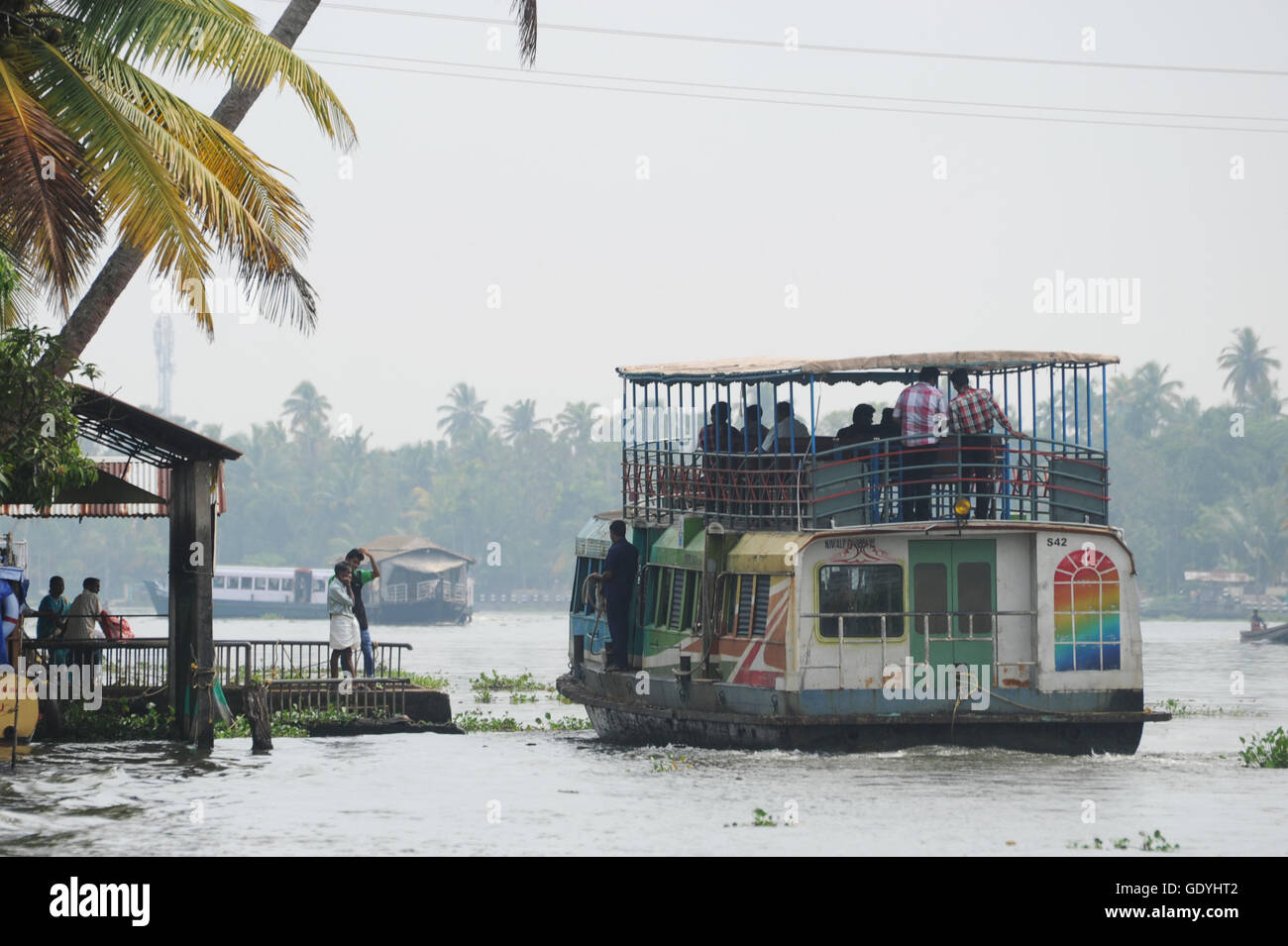 A ferry at a canal of the Kerala backwaters near Alappuzha, India, on ...