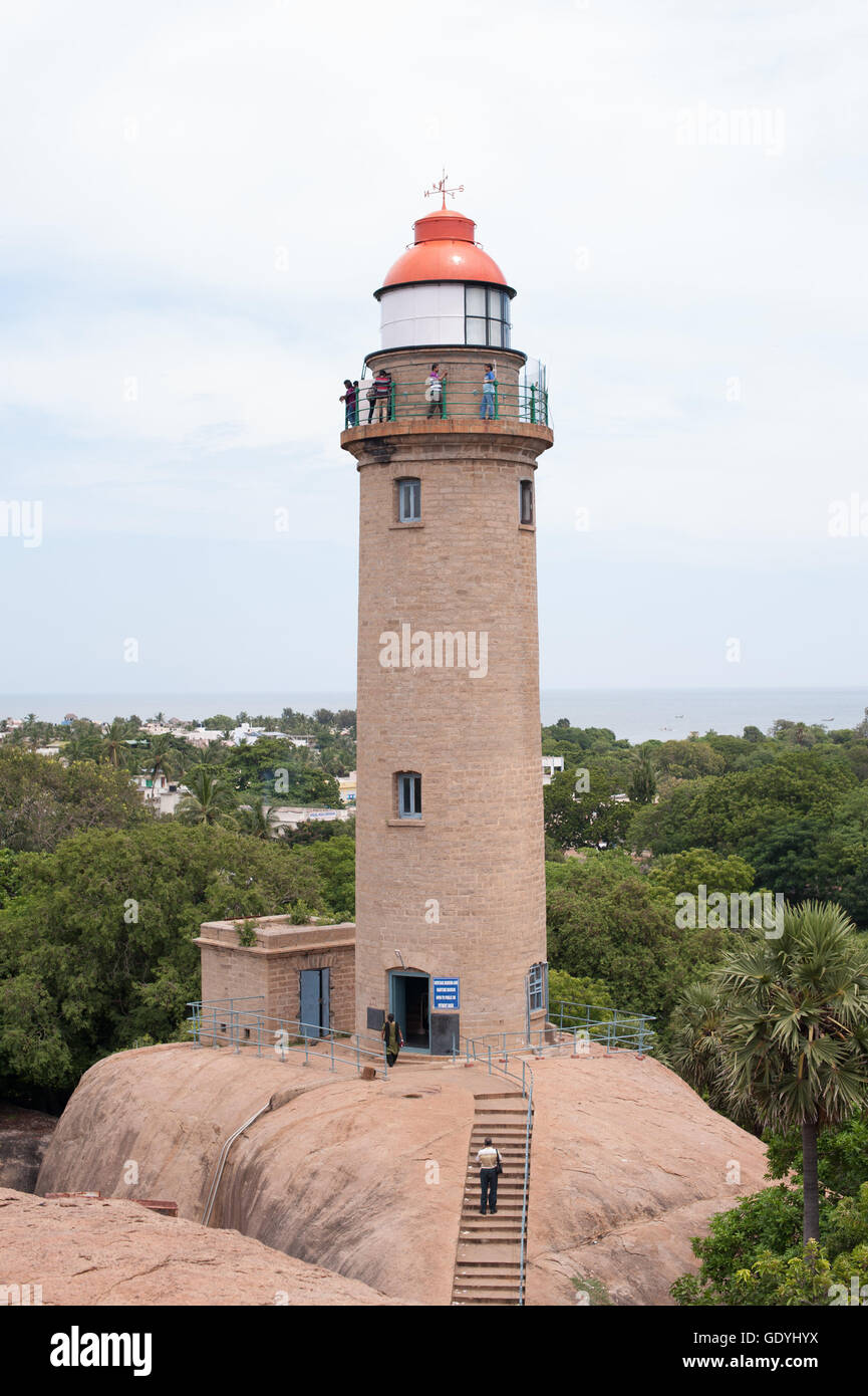 Tourists are standing atop a lighthouse in Mahabalipuram, India, on 10 ...