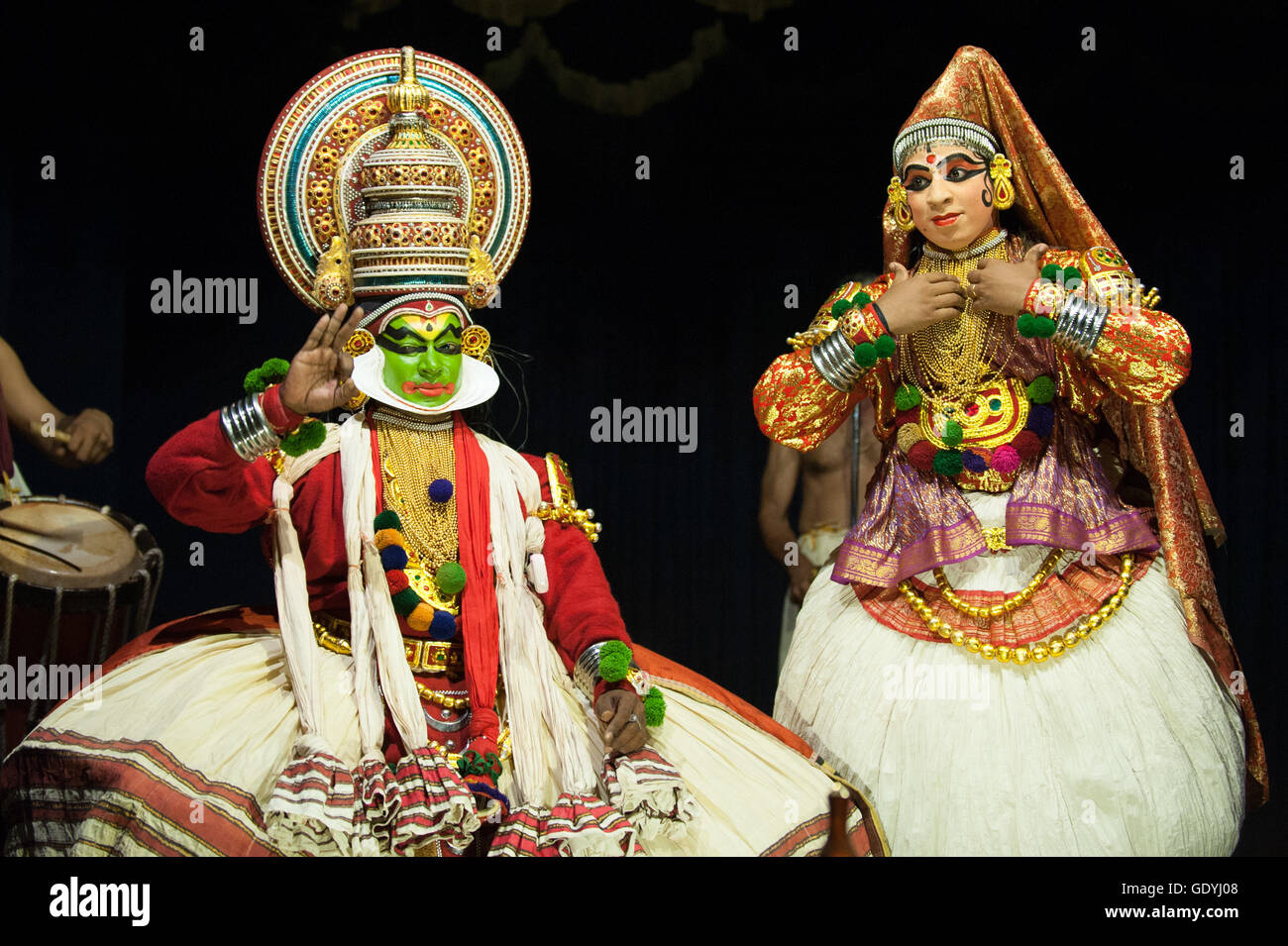 Two Kathakali performer are performing on a stage in Kochi, India, on ...