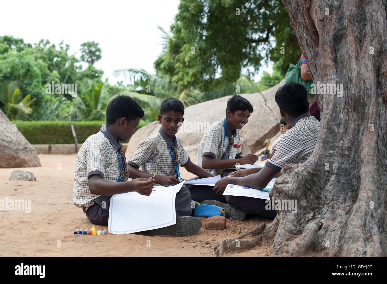Indian students are sitting in a park in Mahabalipuram, India, on 10 ...