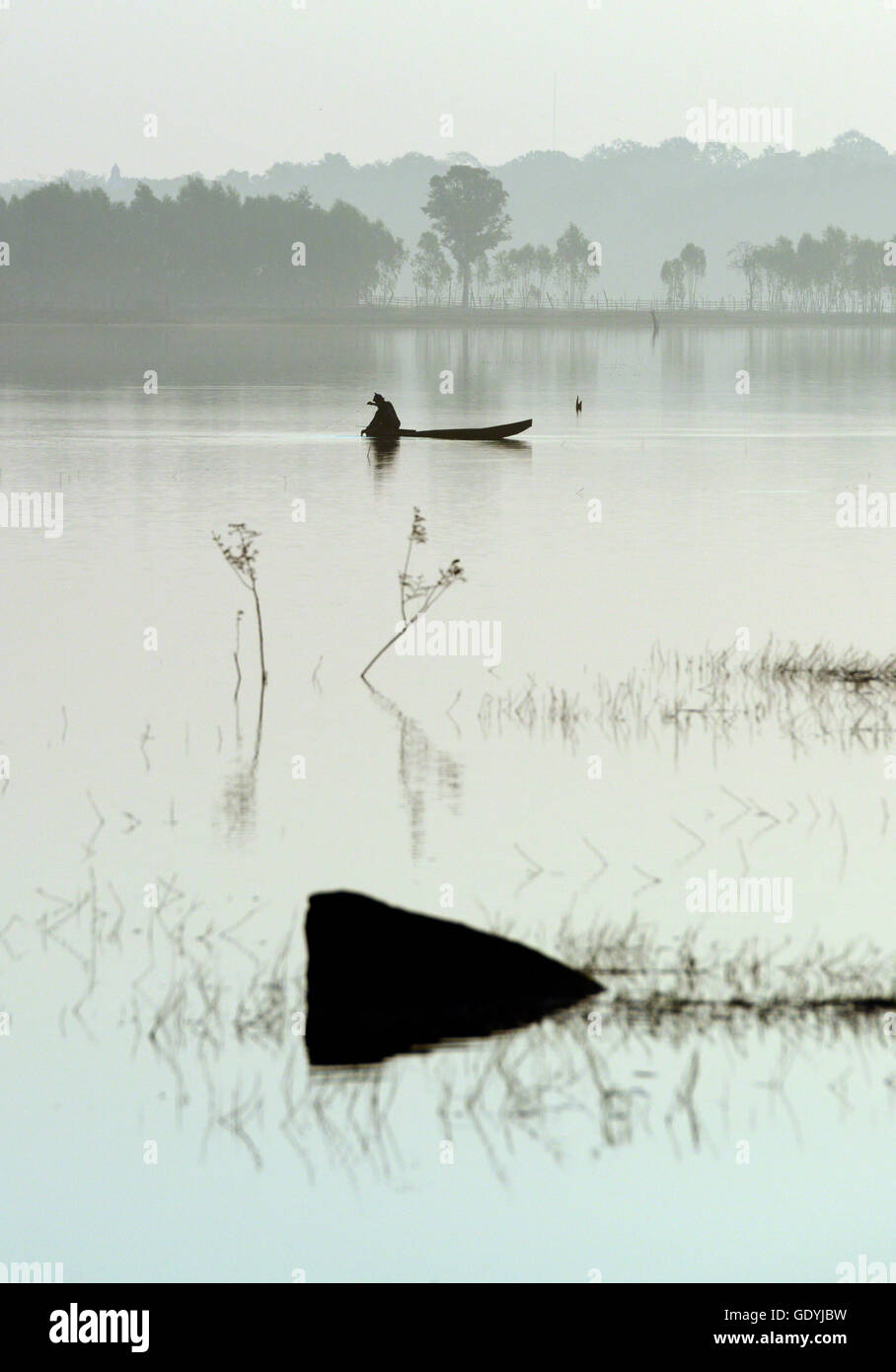 a fishermen on the Lake Amnat Charoen in the city of Amnat Charoen in ...