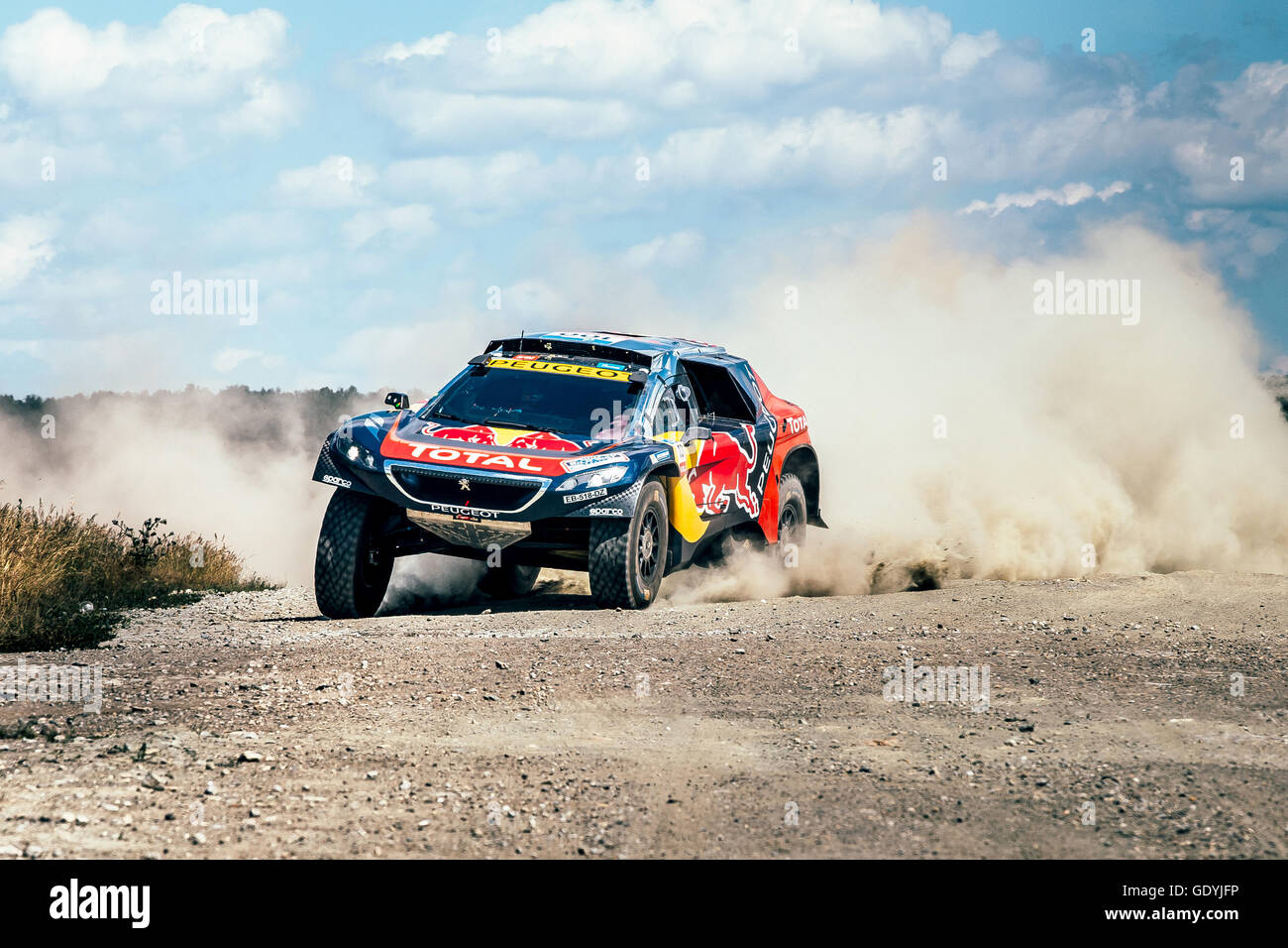 racing car Peugeot driving on a dusty road during Silk way rally Stock ...
