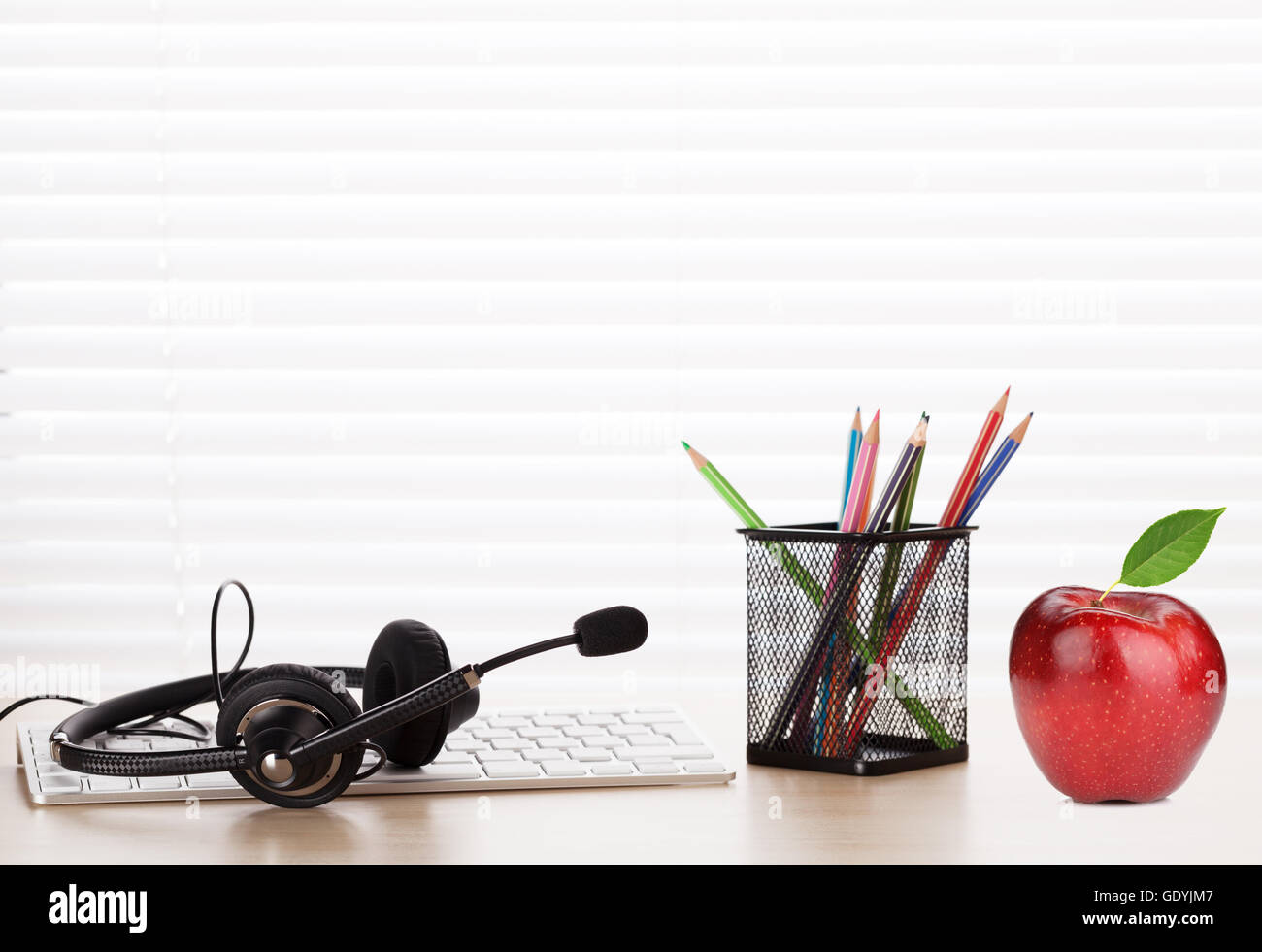 Office desk with headset and pc. Call center support table Stock Photo ...