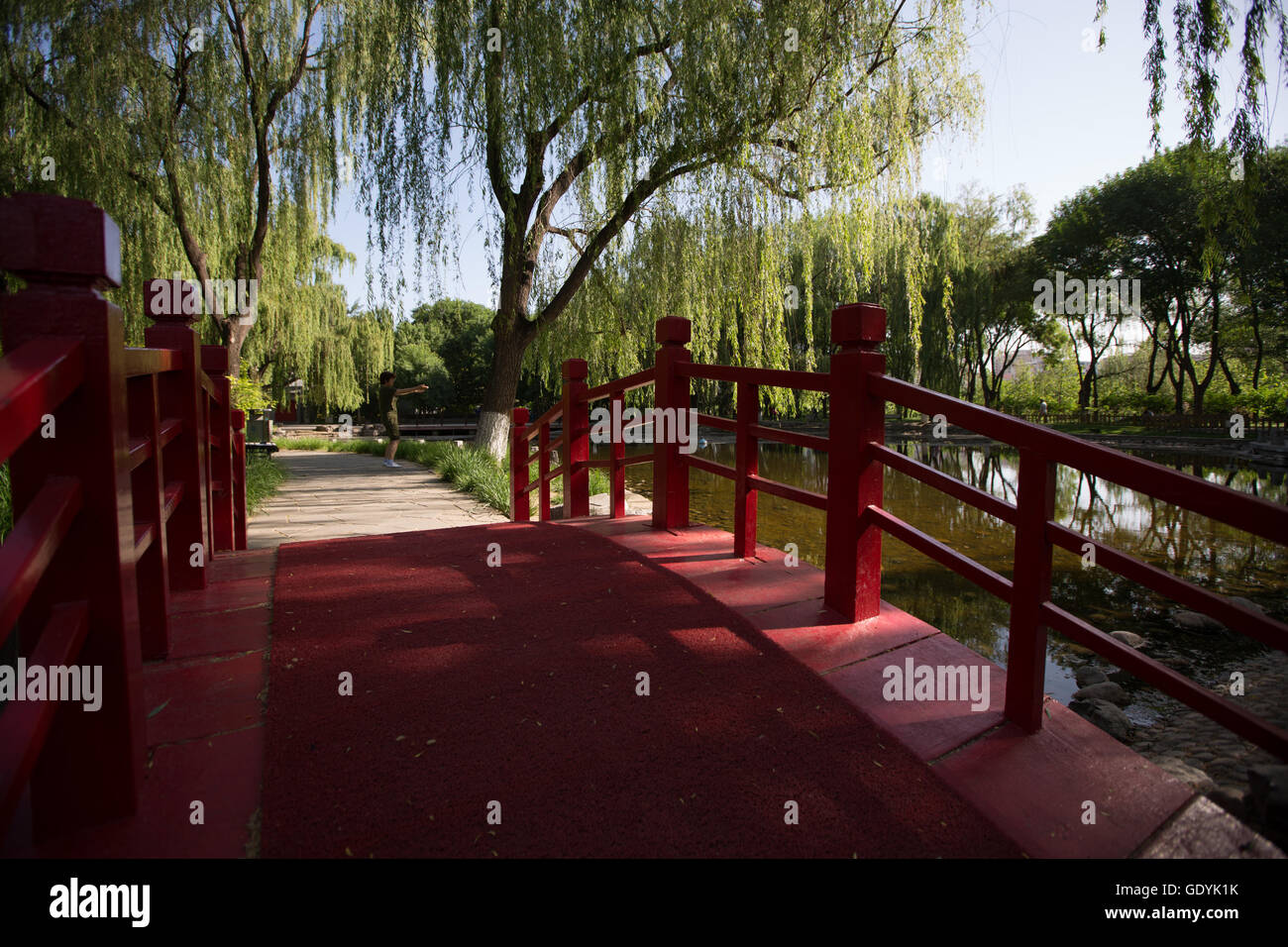 Red bridge in Lenglong Park, in Beijing, China Stock Photo - Alamy