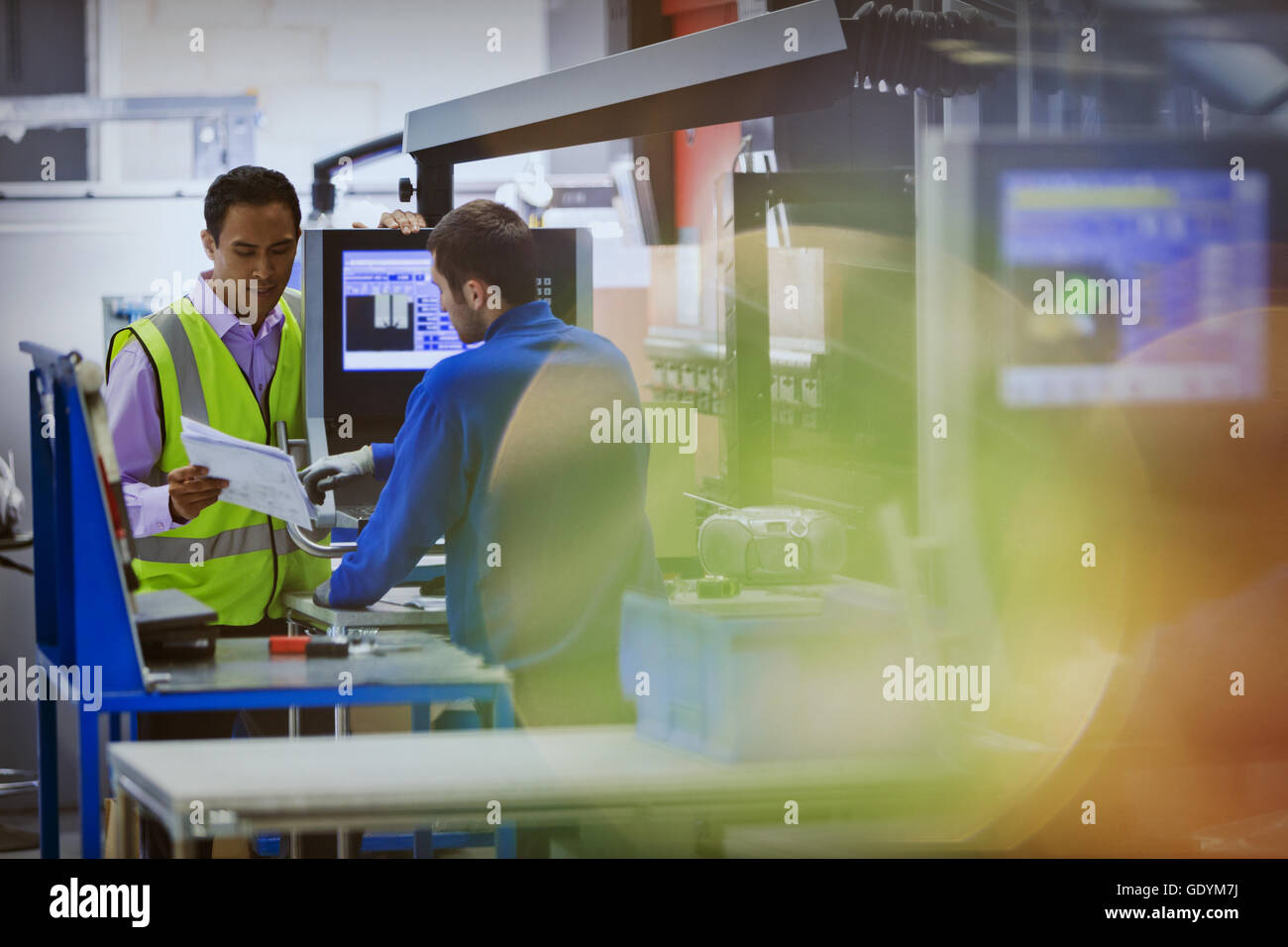 Supervisor talking in steel factory hi-res stock photography and images ...