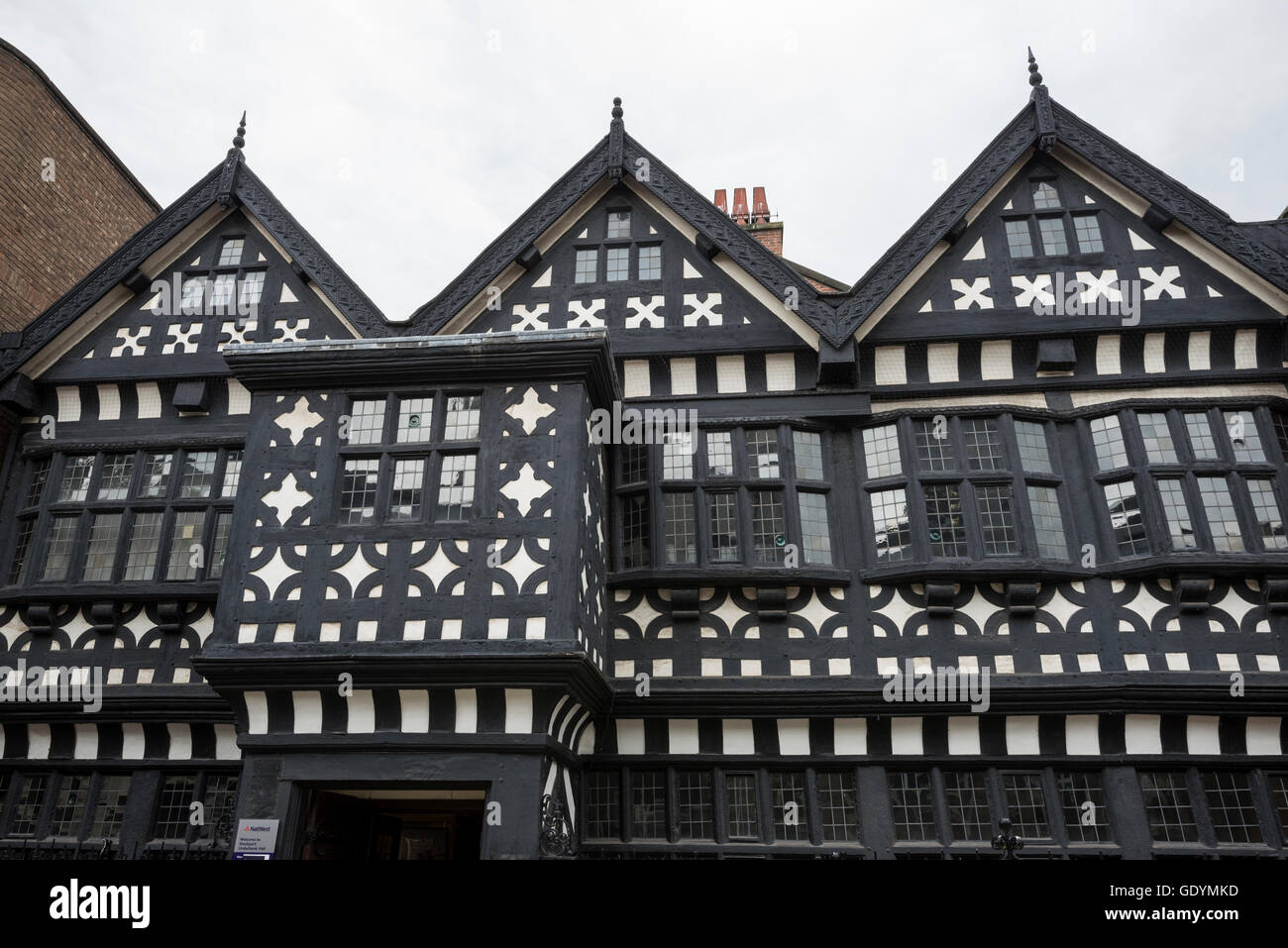 Underbank Hall, a black and white timbered building in the town of ...