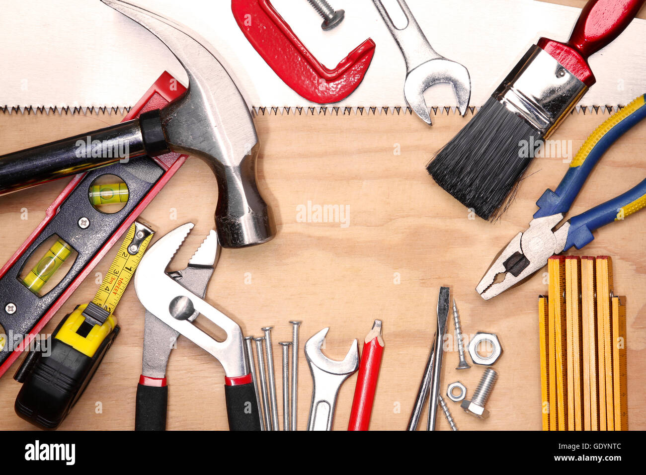Assorted work tools on wood Stock Photo - Alamy