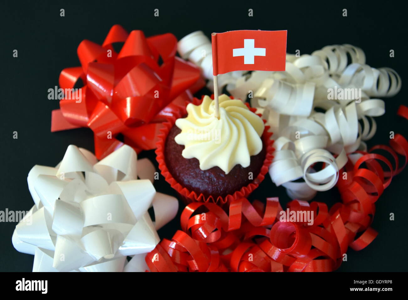 Swiss National Day cupcake with red and white cross swiss flag Stock ...