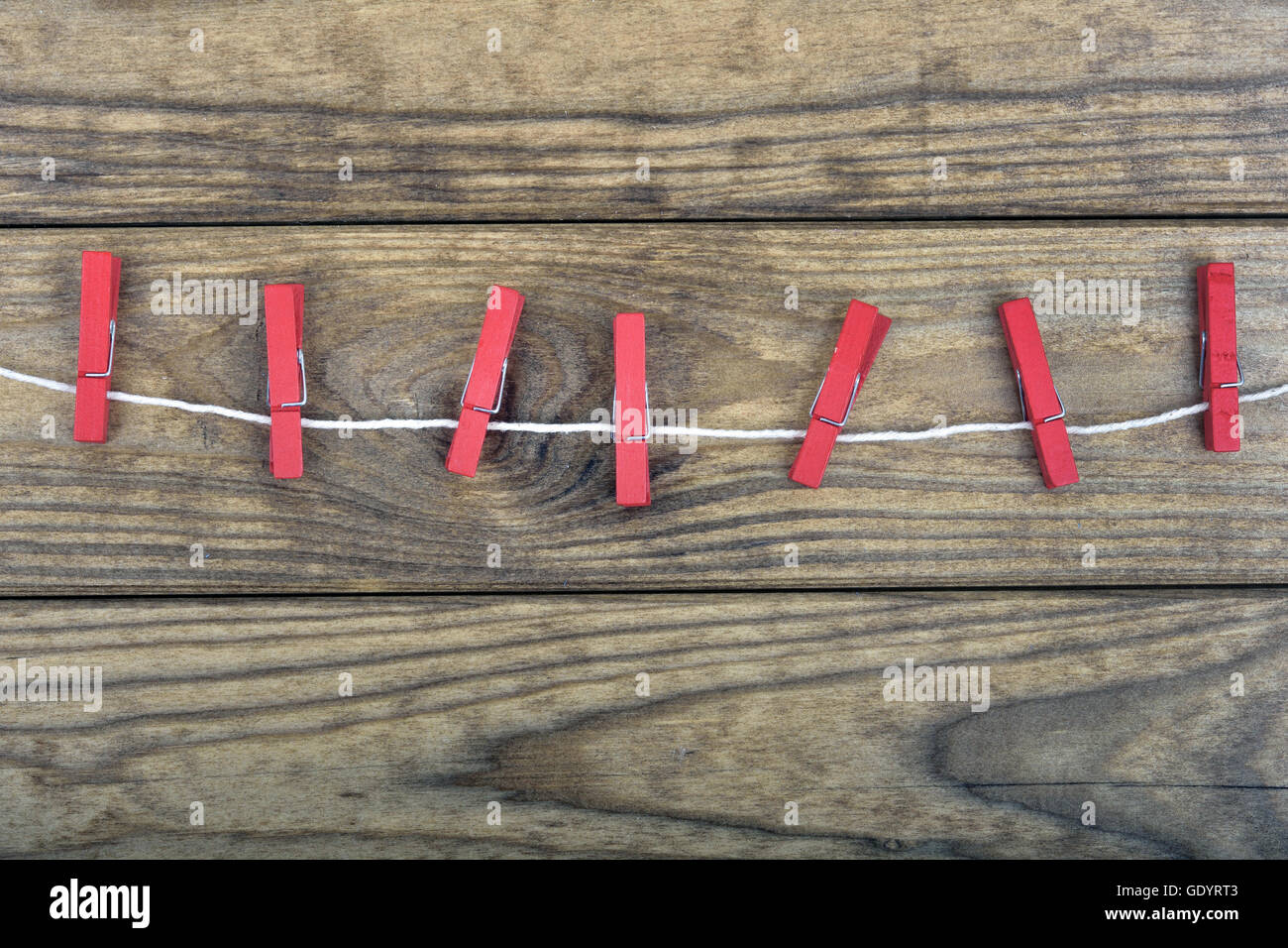 Many post-it on white string Stock Photo - Alamy