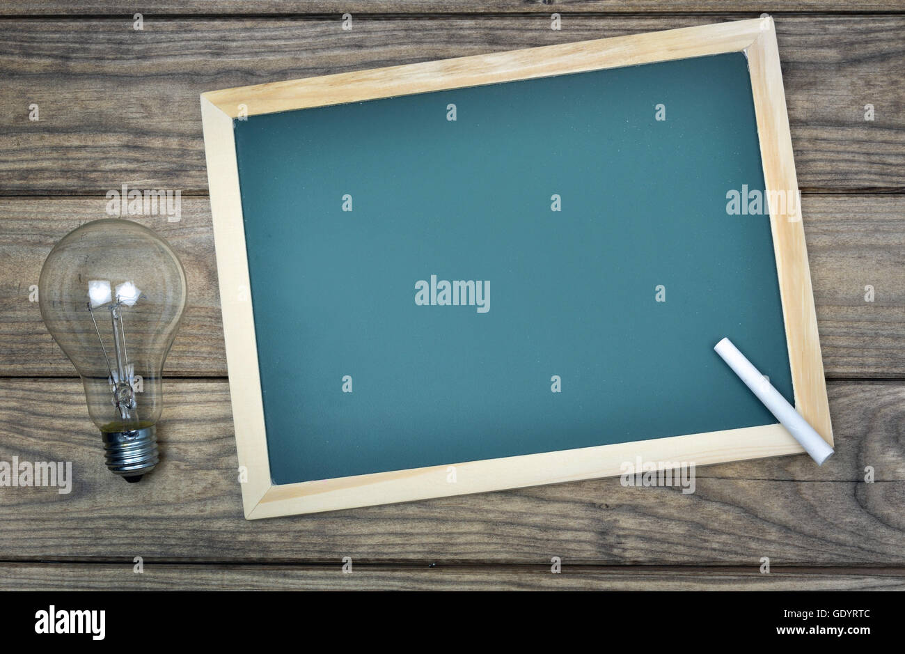 Metallic compass on wooden table Stock Photo - Alamy