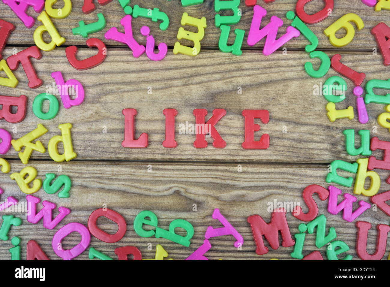 Like word on wooden table Stock Photo - Alamy