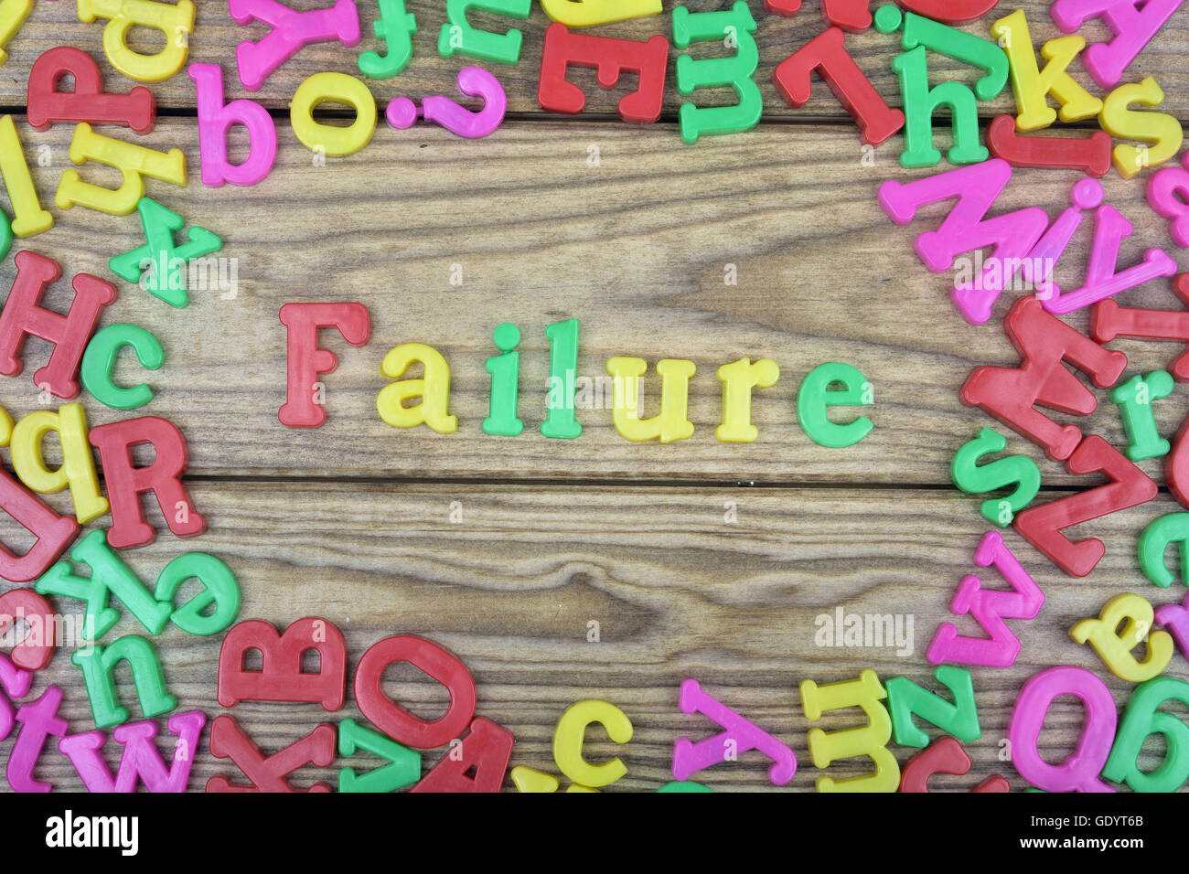 Failure word on wooden table Stock Photo - Alamy