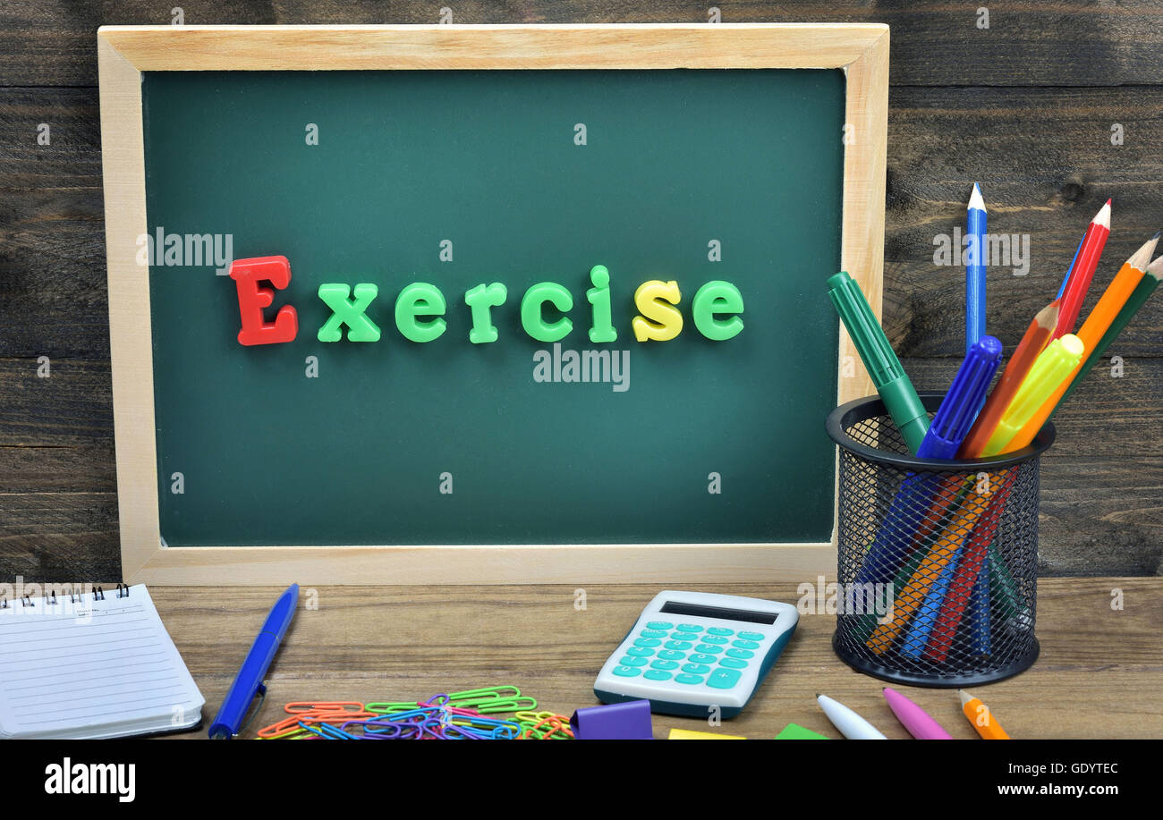 Exercise word on school board Stock Photo - Alamy