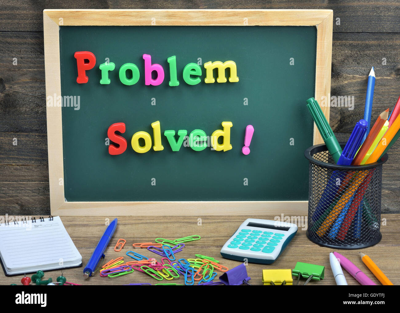 Problems and solutions text on school board Stock Photo - Alamy