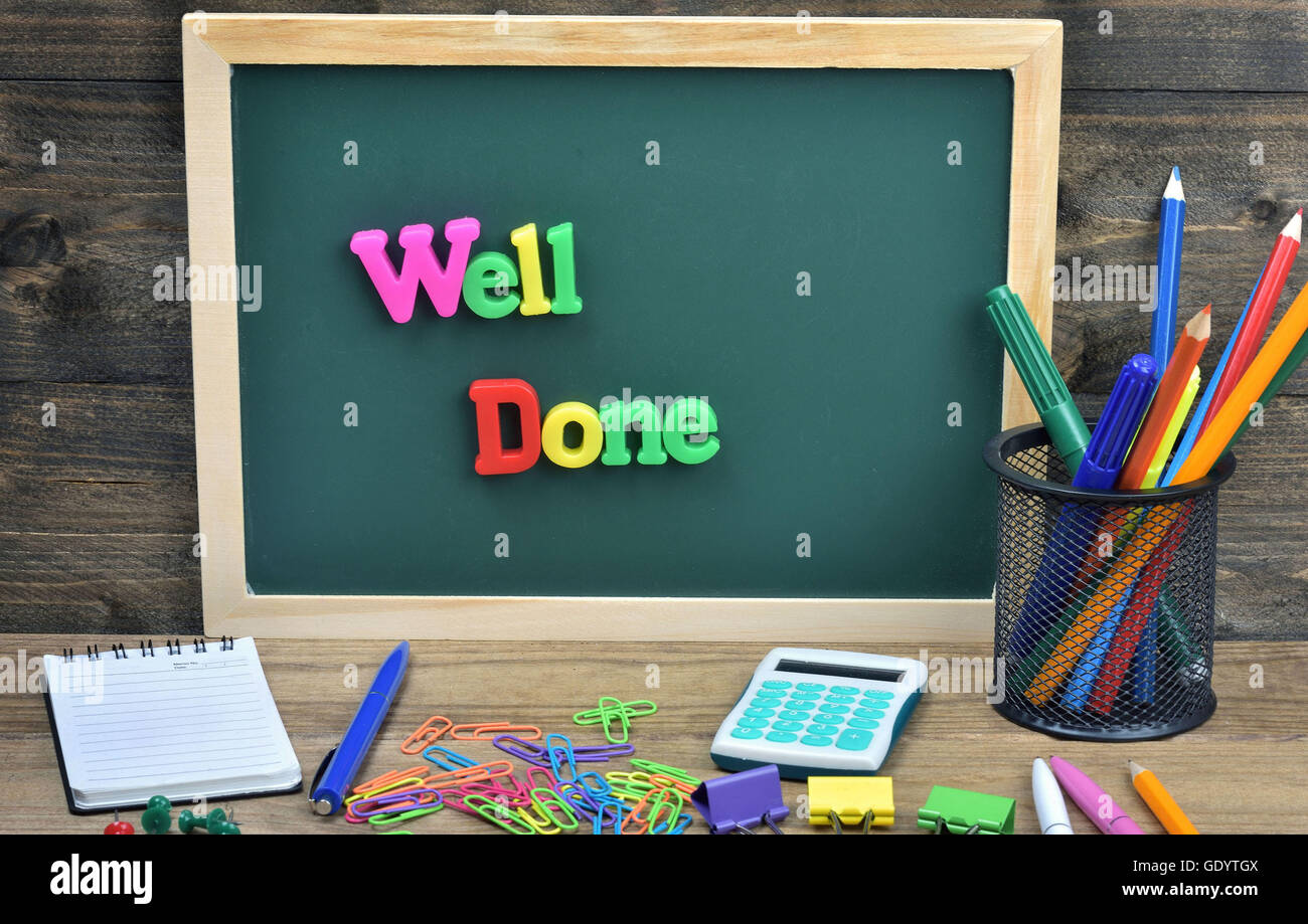 Well done word on school board Stock Photo - Alamy