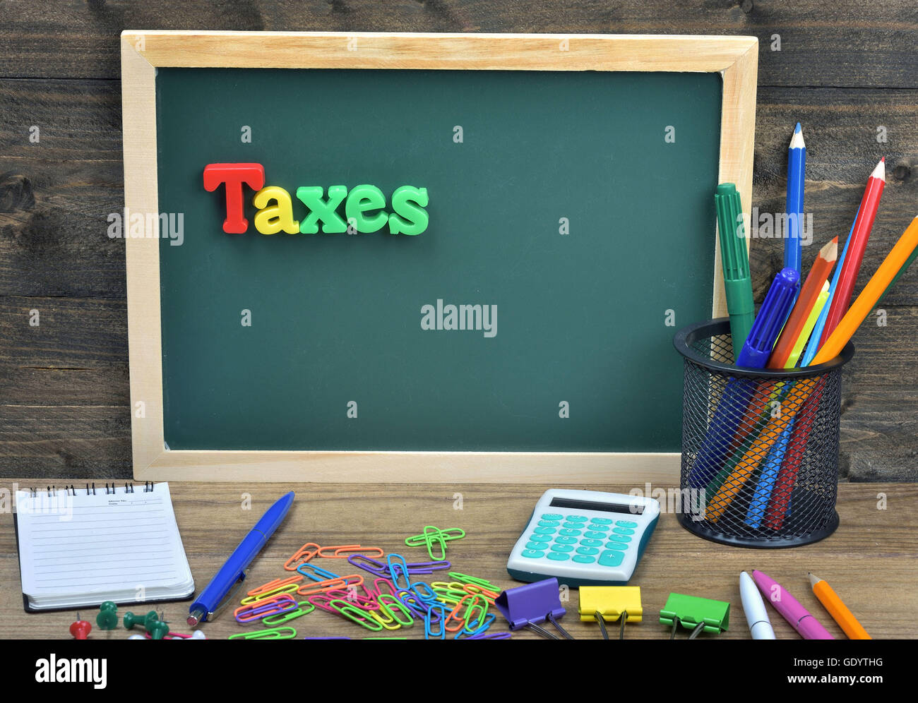 Taxes on school board Stock Photo - Alamy