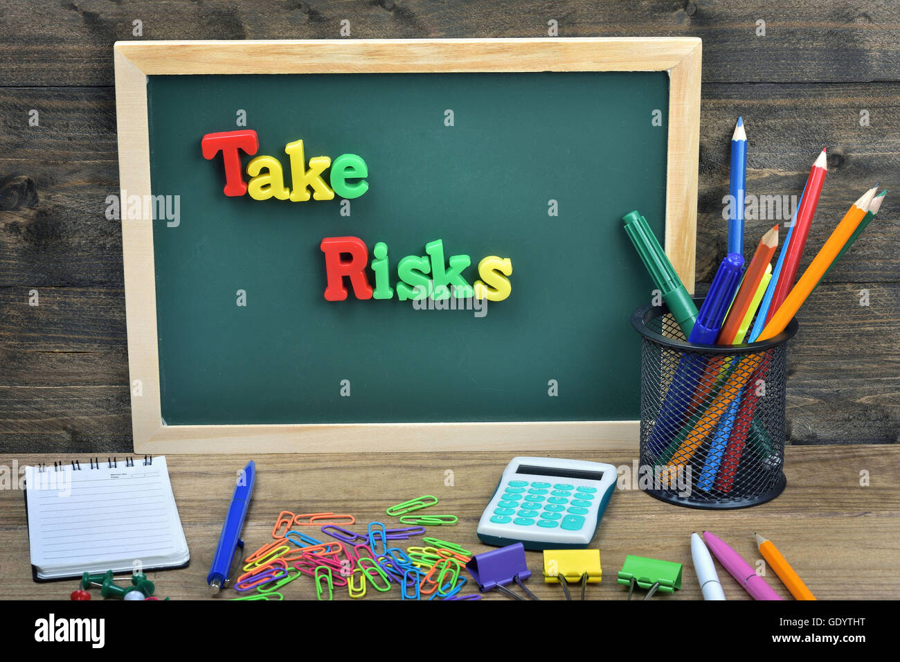 Take risks word on school board Stock Photo - Alamy