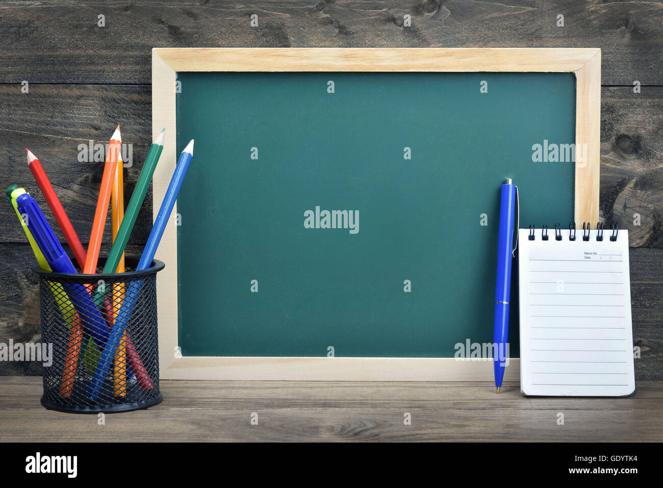 School board and notepad on wooden table Stock Photo - Alamy