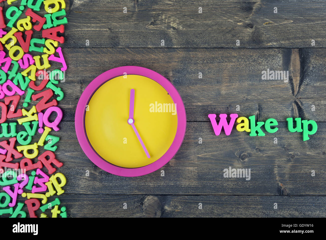 Wake up word on wooden table Stock Photo - Alamy