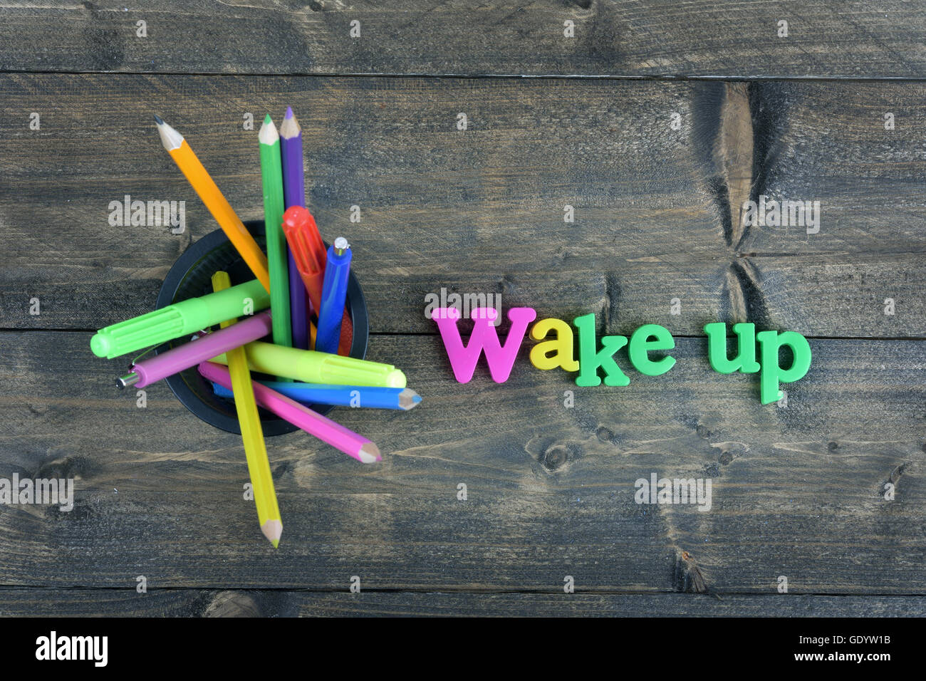 Wake up word on wooden table Stock Photo - Alamy