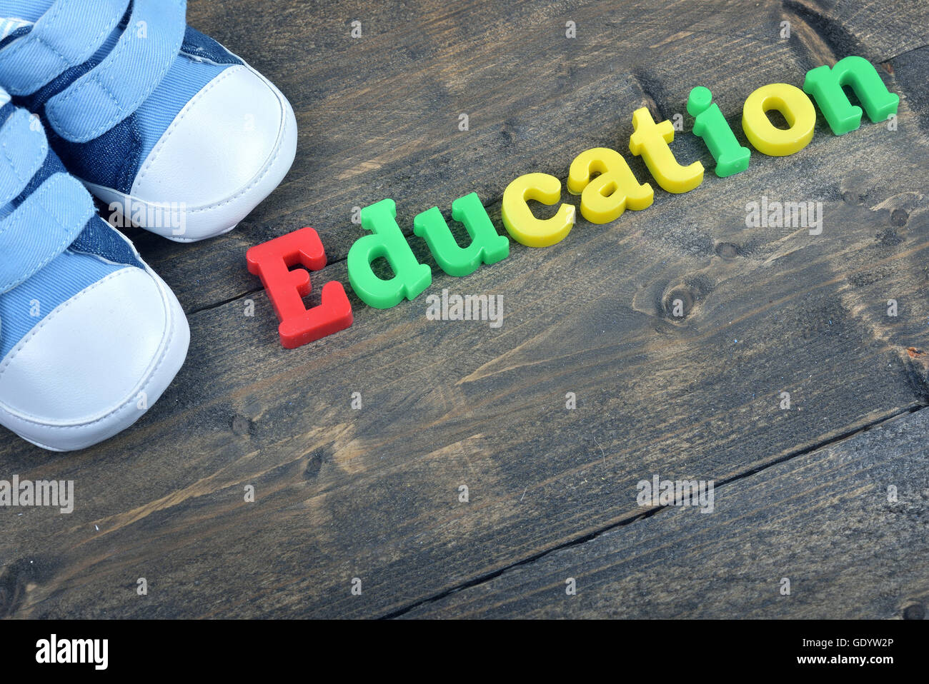 Education word on wooden table Stock Photo - Alamy